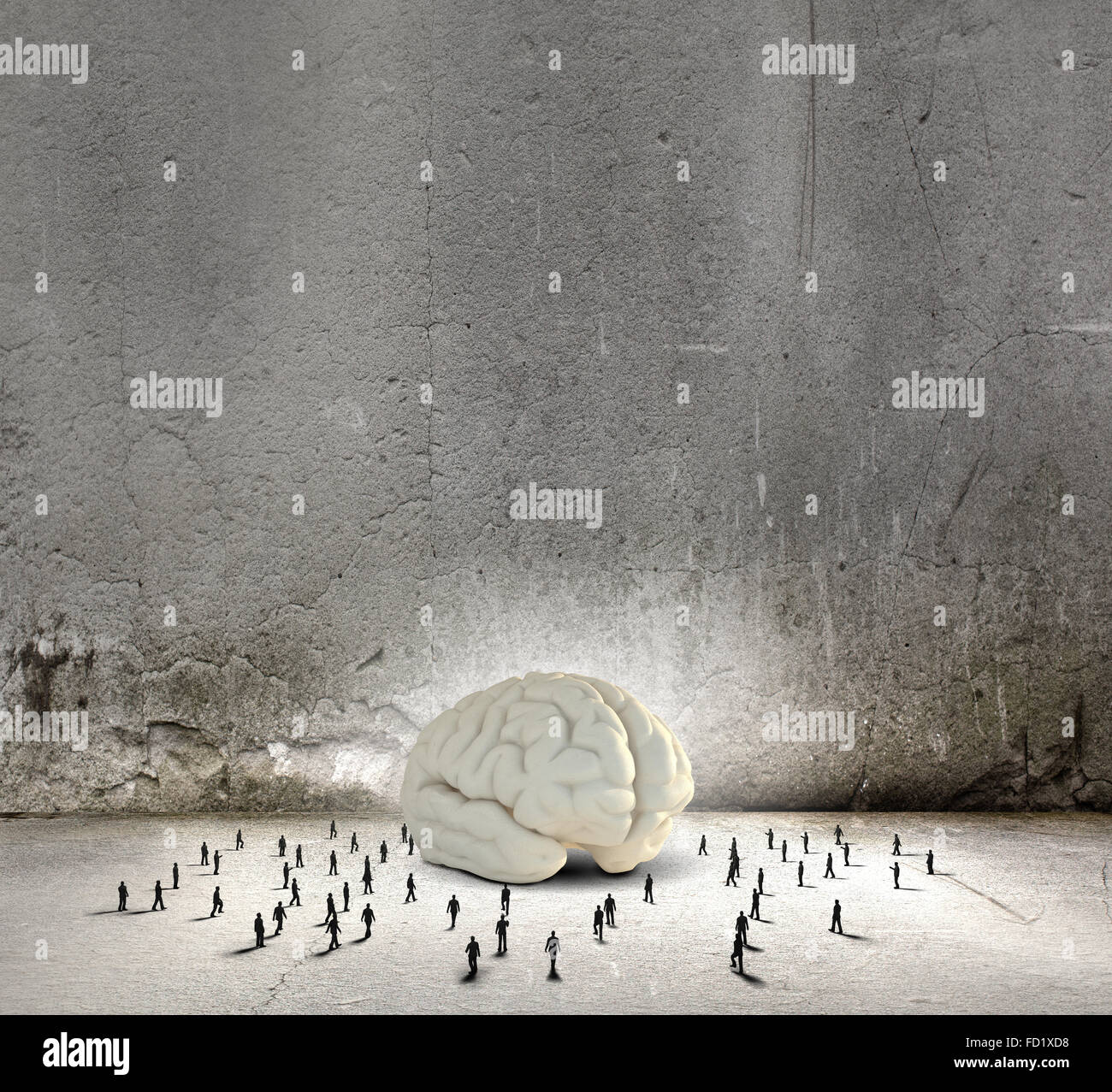 Huge human brain and many little businesspeople around Stock Photo - Alamy