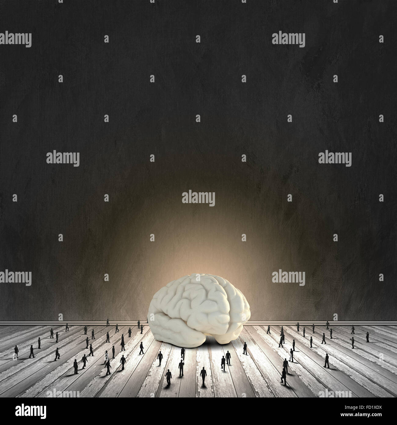 Huge human brain and many little businesspeople around Stock Photo - Alamy