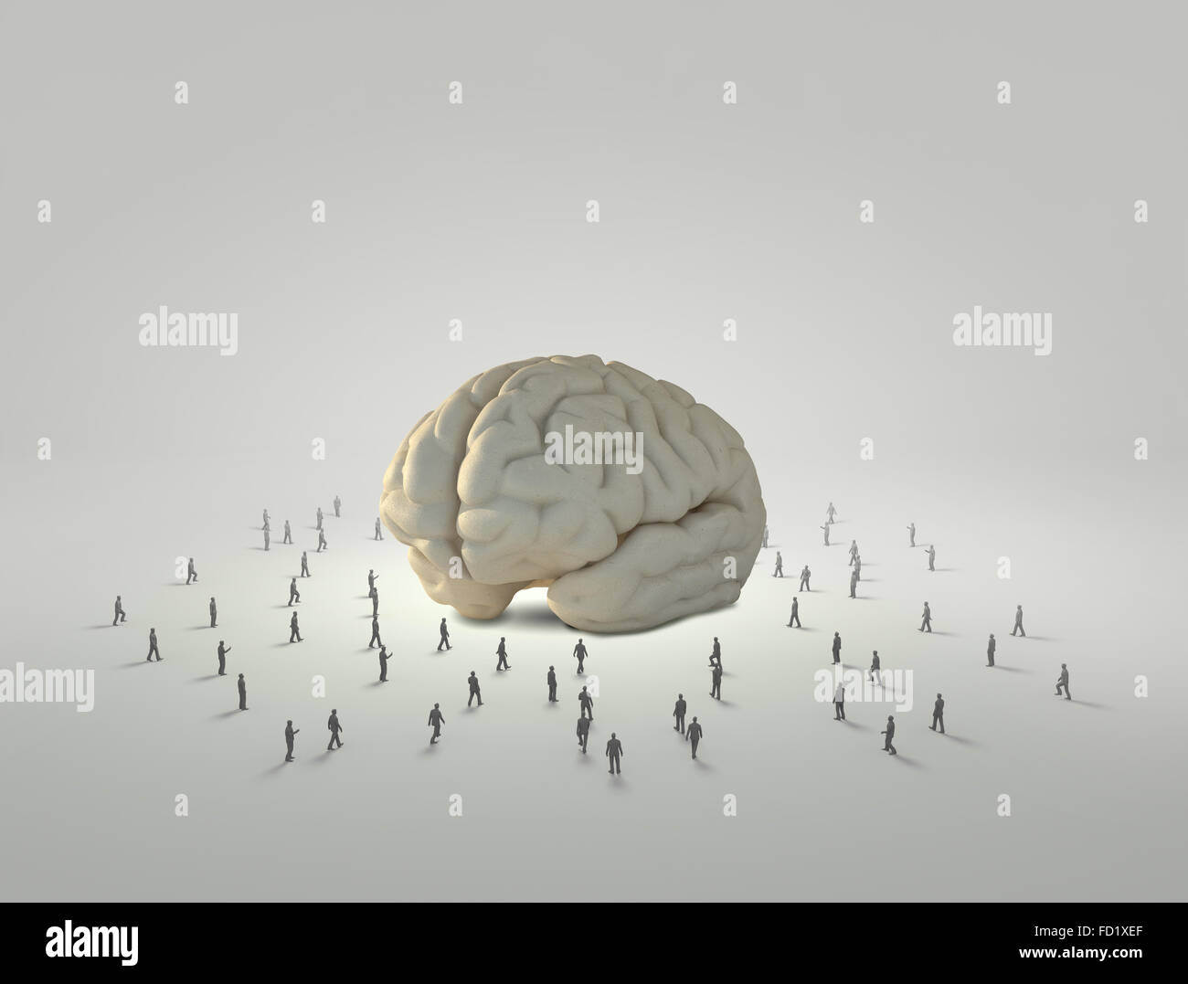 Huge human brain and many little businesspeople around Stock Photo - Alamy
