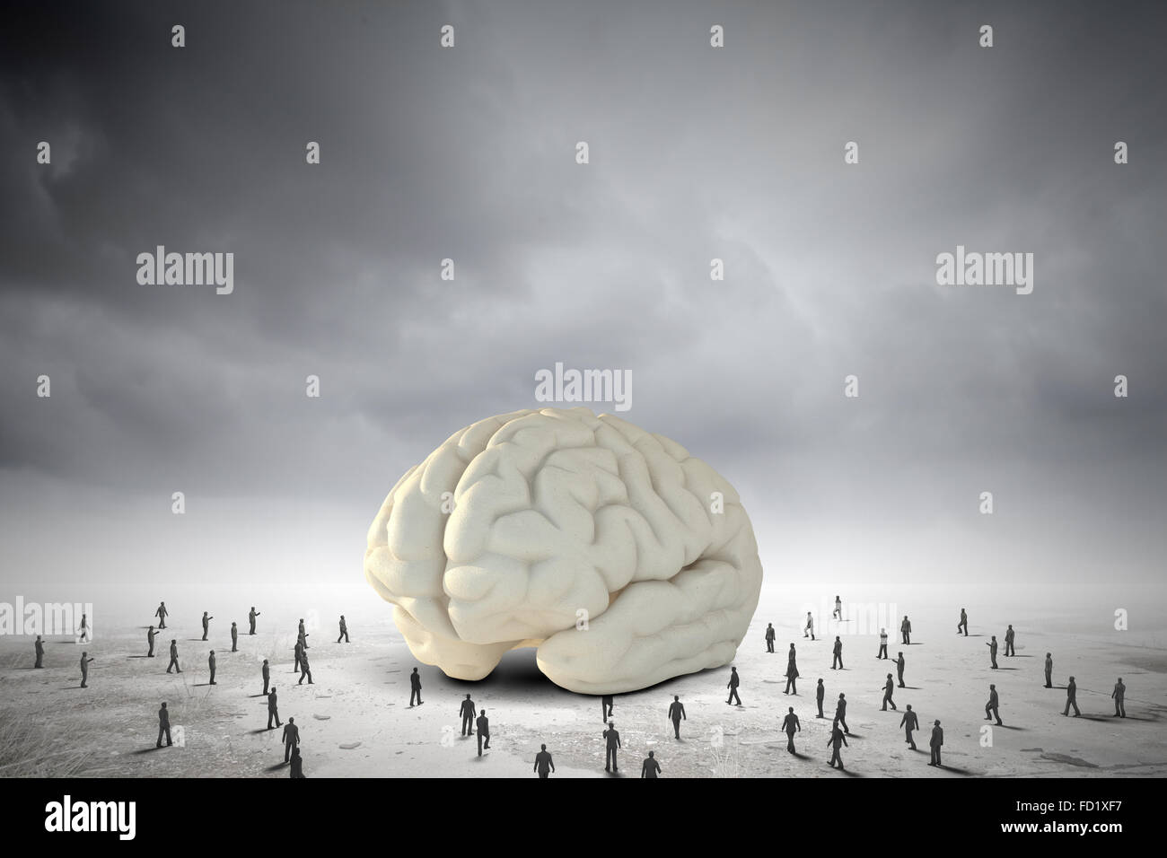 Huge human brain and many little businesspeople around Stock Photo - Alamy