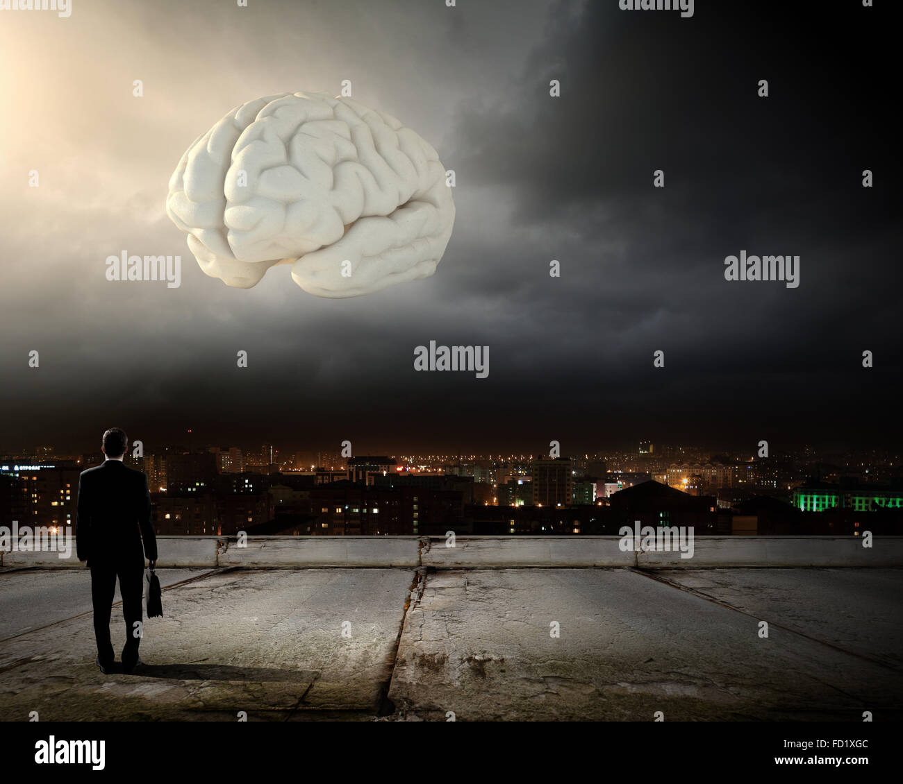 Rear view of businessman looking at big brain model Stock Photo - Alamy
