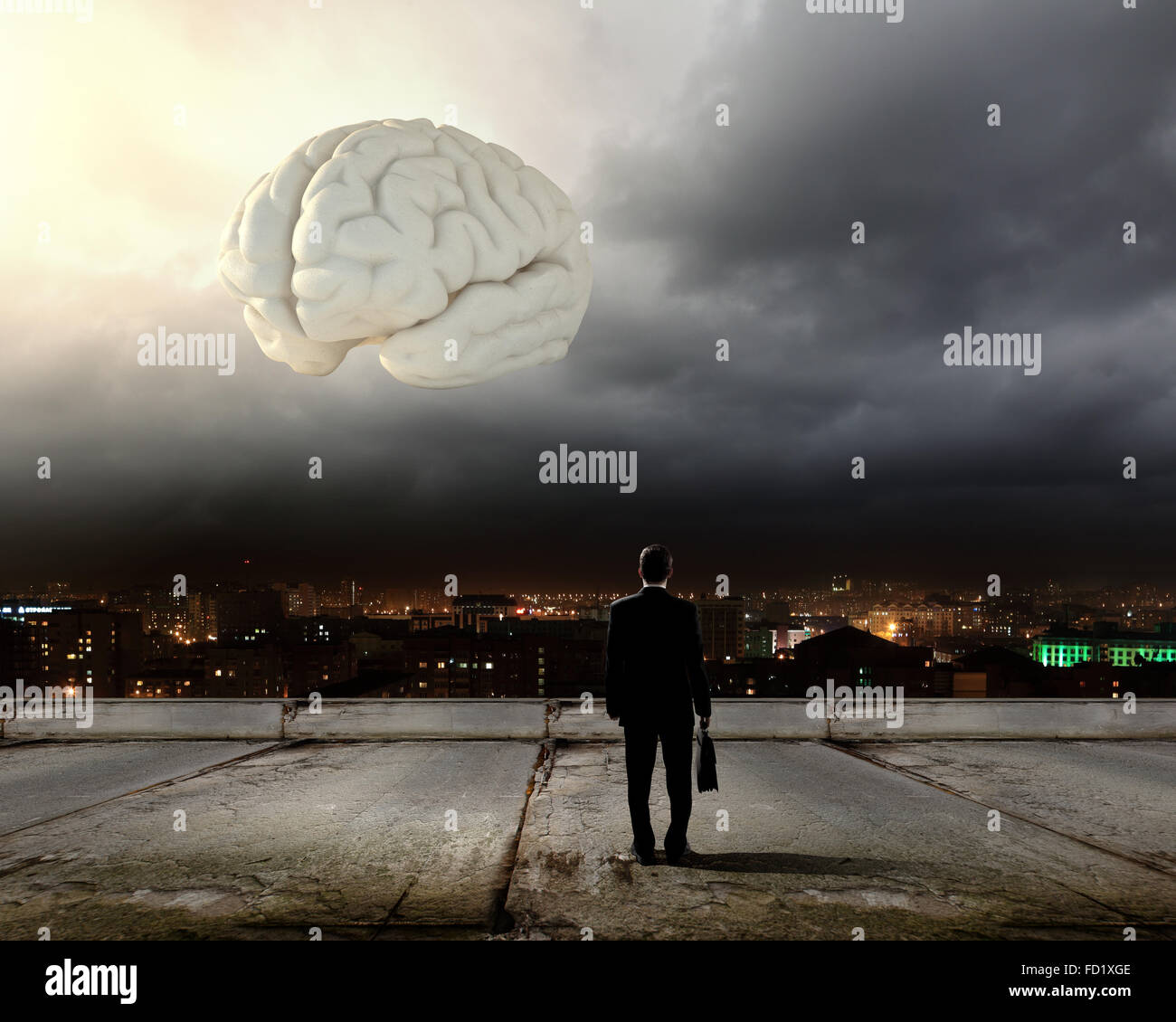 Rear view of businessman looking at big brain model Stock Photo - Alamy