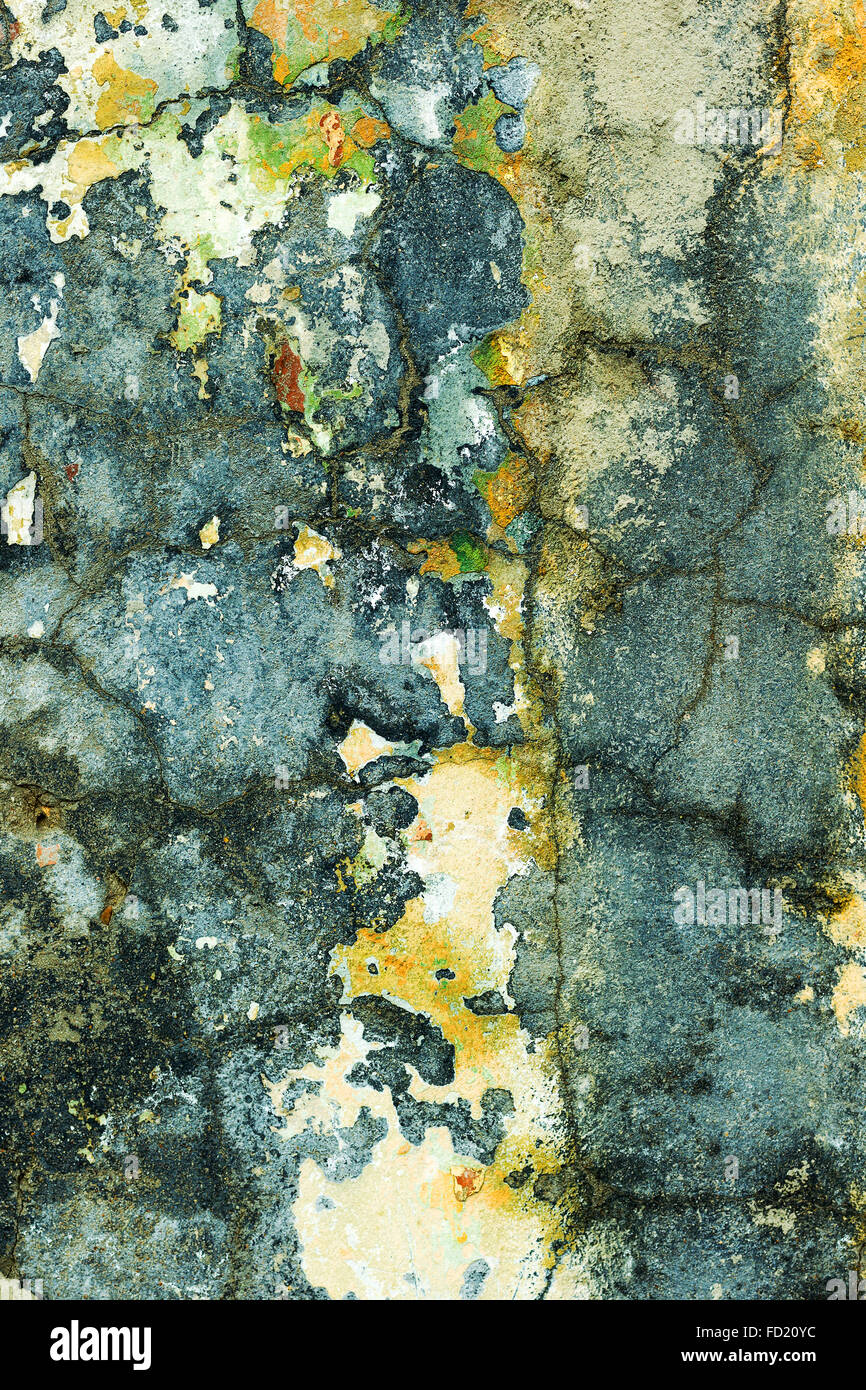 Dirty concrete wall with streaks of water, stains, cracks and scratches ...