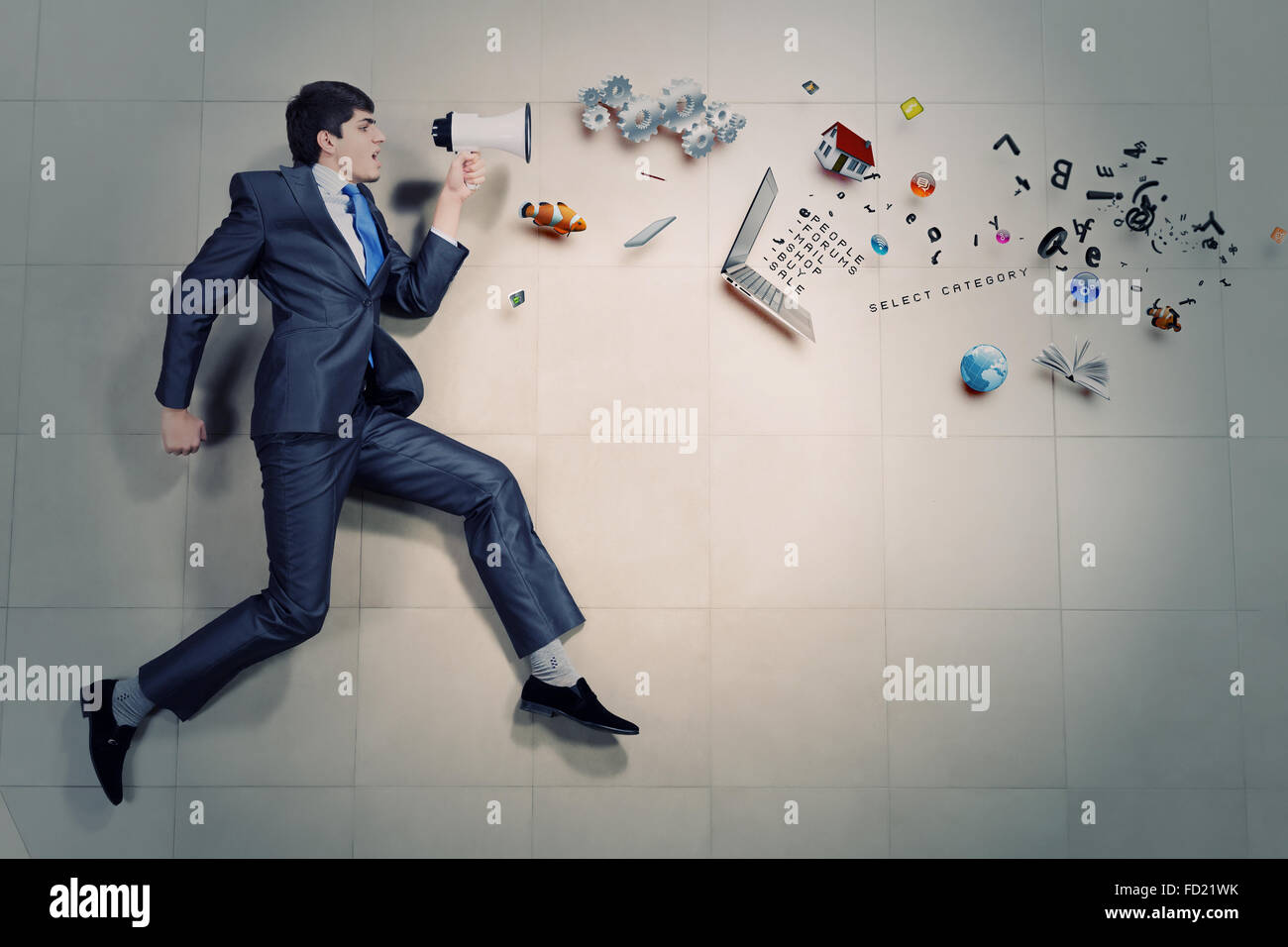 Young businessman running with megaphone in hand Stock Photo - Alamy