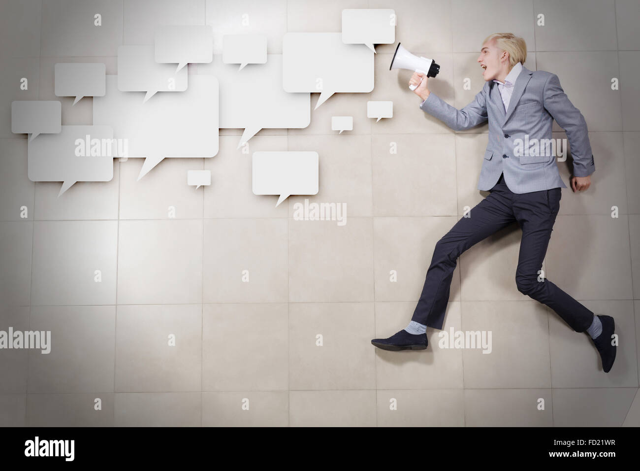 Man running megaphone in hi-res stock photography and images - Alamy