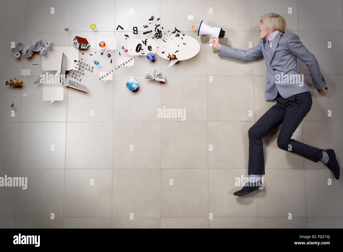 Young businessman running with megaphone in hand Stock Photo - Alamy