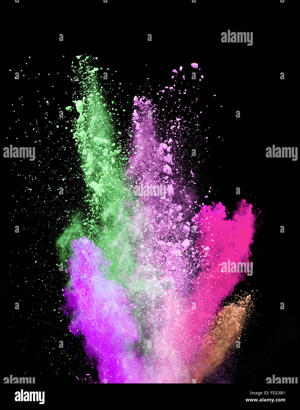 Colored powder explosion isolated on black background Stock Photo - Alamy