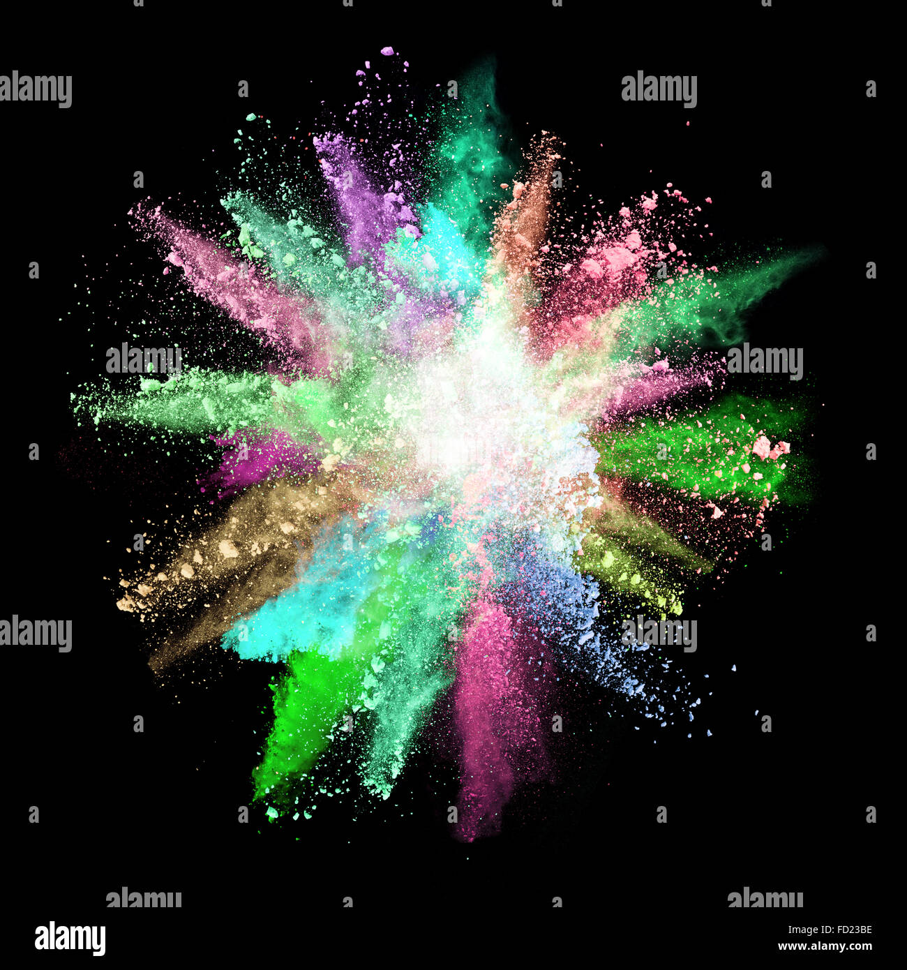 Colored powder explosion isolated on black background Stock Photo - Alamy