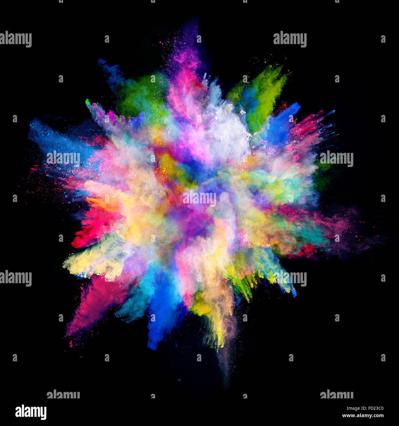 Colored powder explosion isolated on black background Stock Photo - Alamy