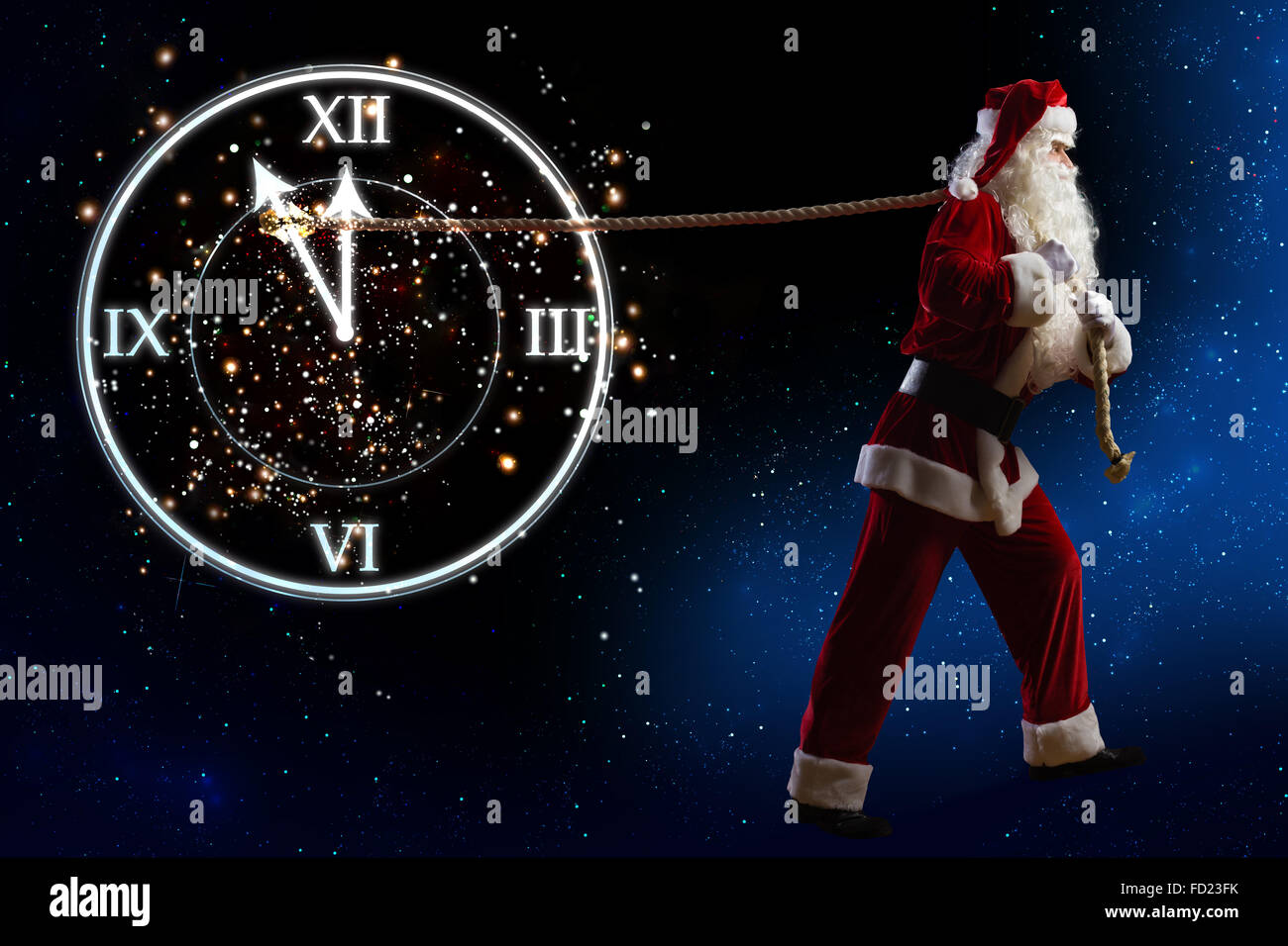 Santa Claus and clock showing five minutes to twelve Stock Photo - Alamy