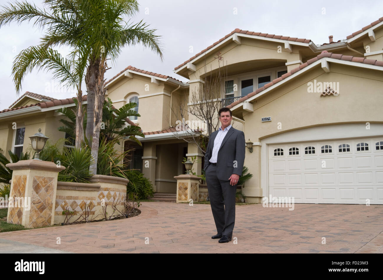David Balen, insurance executive, stands in front of his home in Porter ...