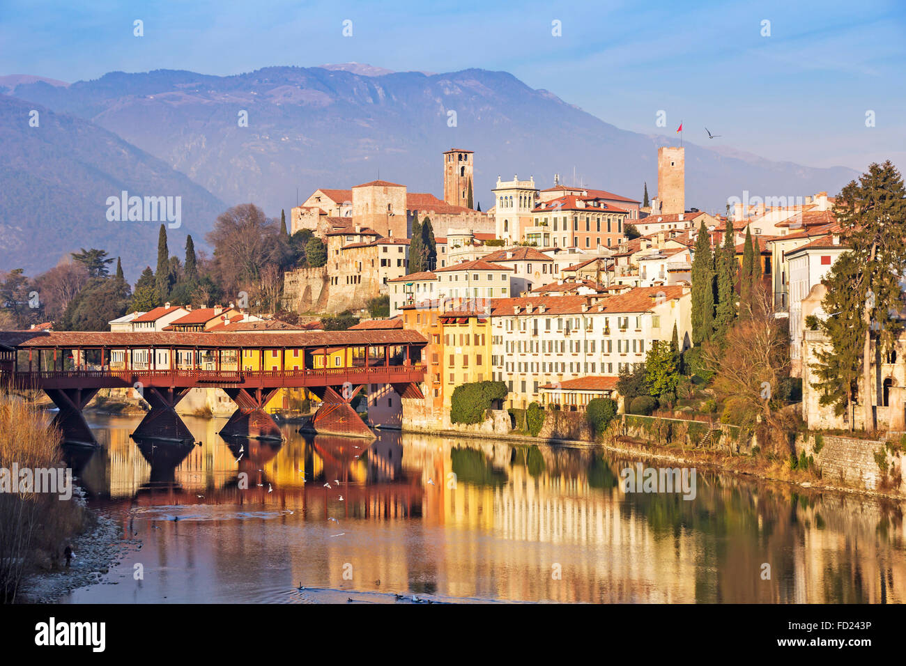 Famous old wooden bridge (Ponte Vecchio) in village Bassano del Grappa ...