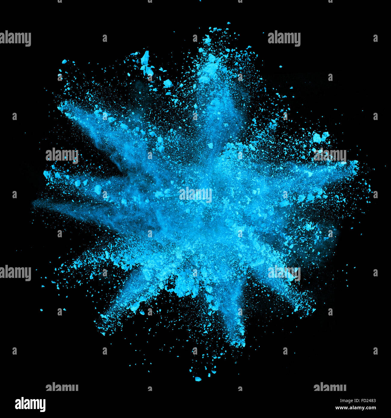 Explosion of blue powder, isolated on black background Stock Photo - Alamy