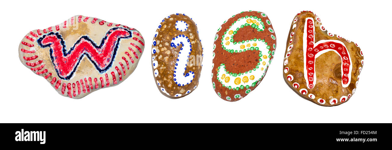 Wish word made of hand painted stones Stock Photo - Alamy