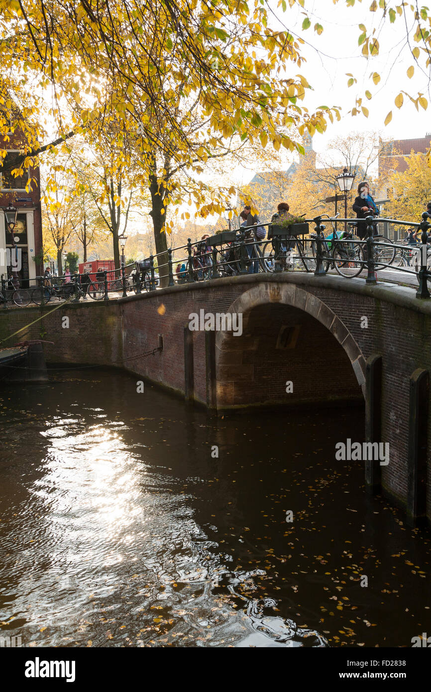 Canal bridge Autumn / fall with sun / sunny blue sky in Amsterdam ...