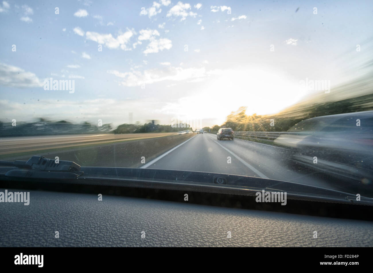 Inside view of car that runs fast in motorway Stock Photo - Alamy