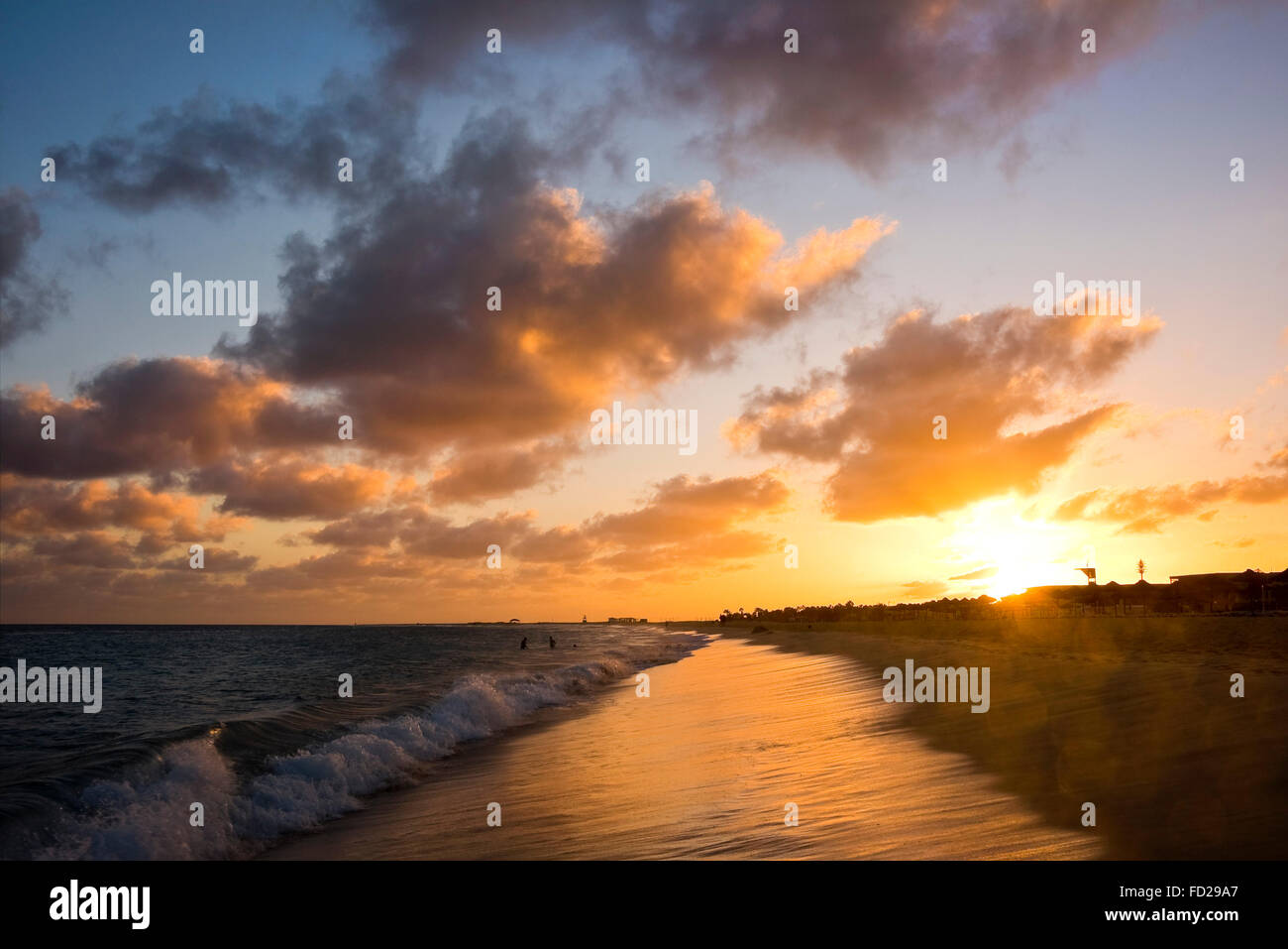 Horizontal view of the sunsetting over Praia de Santa Maria in Cape ...