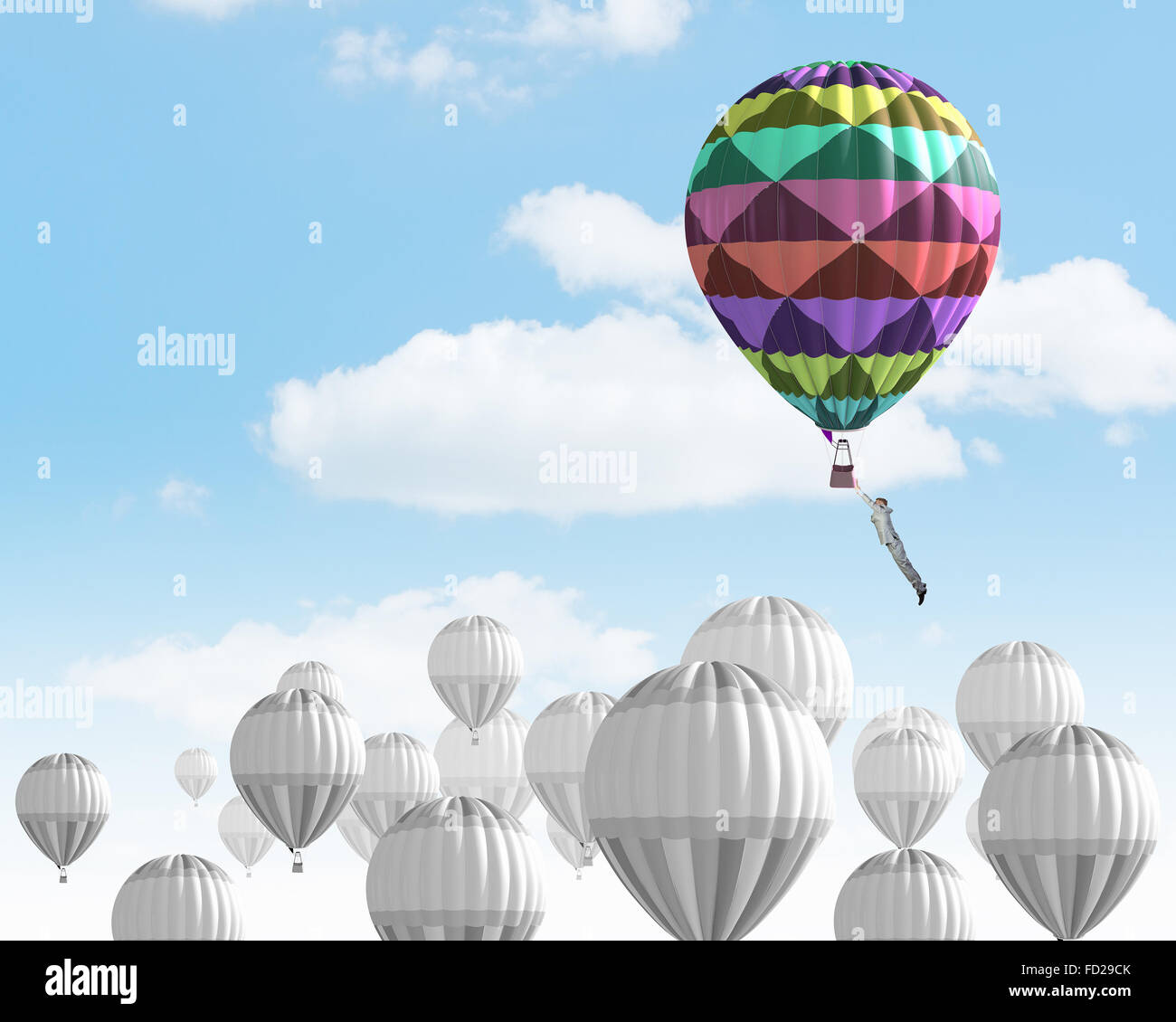 Conceptual image with balloons flying high in sky Stock Photo - Alamy