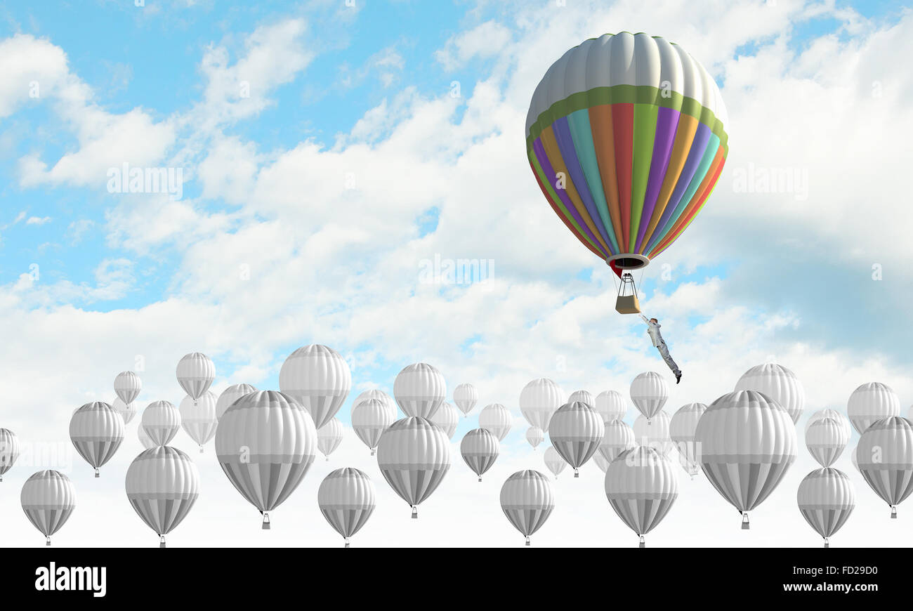 Conceptual image with balloons flying high in sky Stock Photo - Alamy
