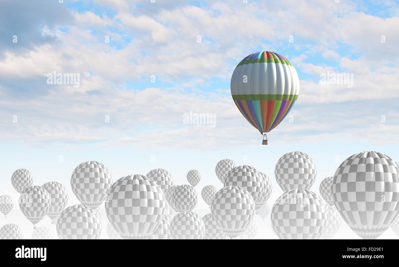 Conceptual image with balloons flying high in sky Stock Photo - Alamy
