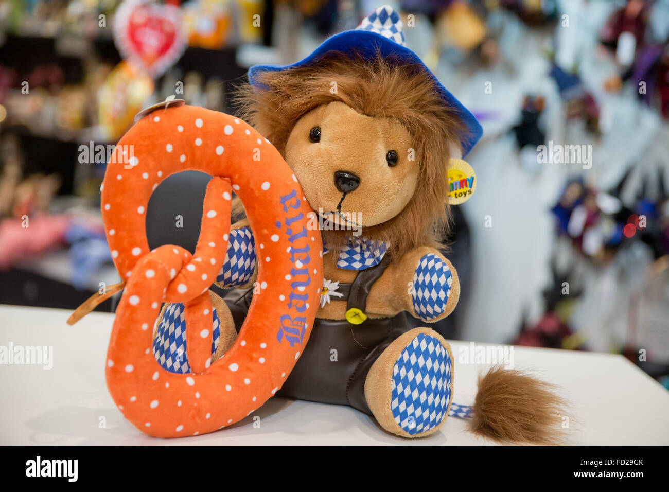A cuddly toy in the shape of a bear sporting the blue and white ...