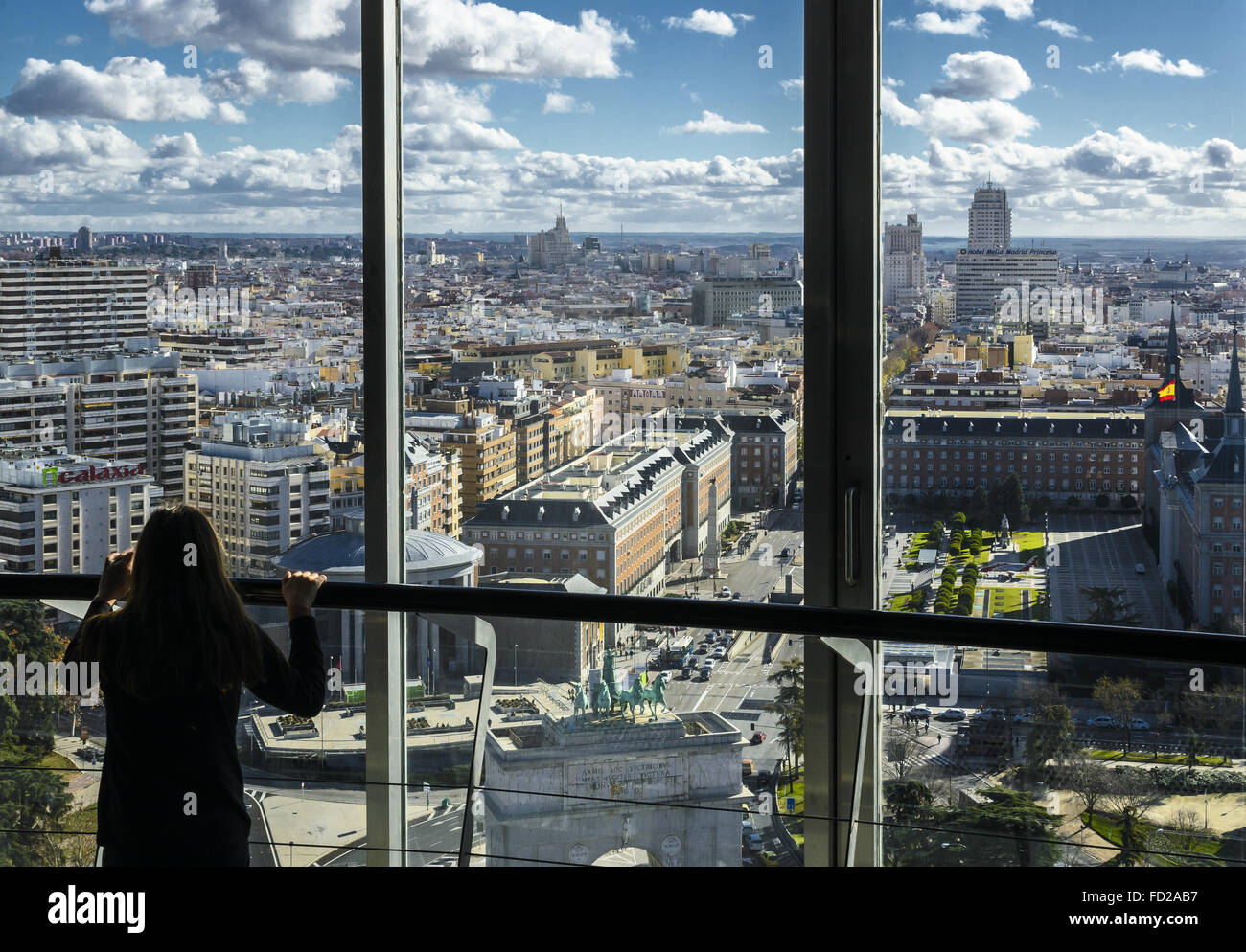 A observer watching the urban landscape of Madrid city from Moncloa ...