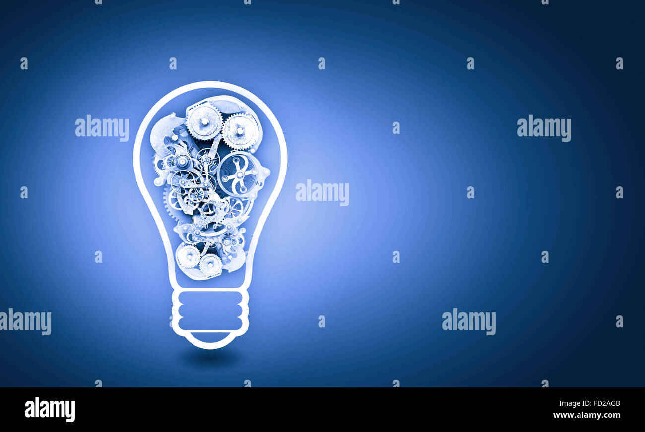 Conceptual image of light bulb with cogwheels inside Stock Photo - Alamy