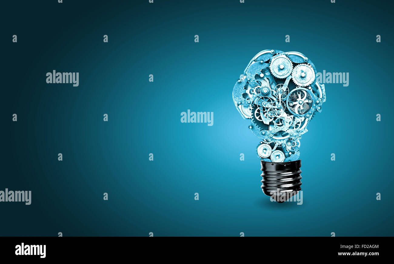 Conceptual image of light bulb with cogwheels inside Stock Photo - Alamy