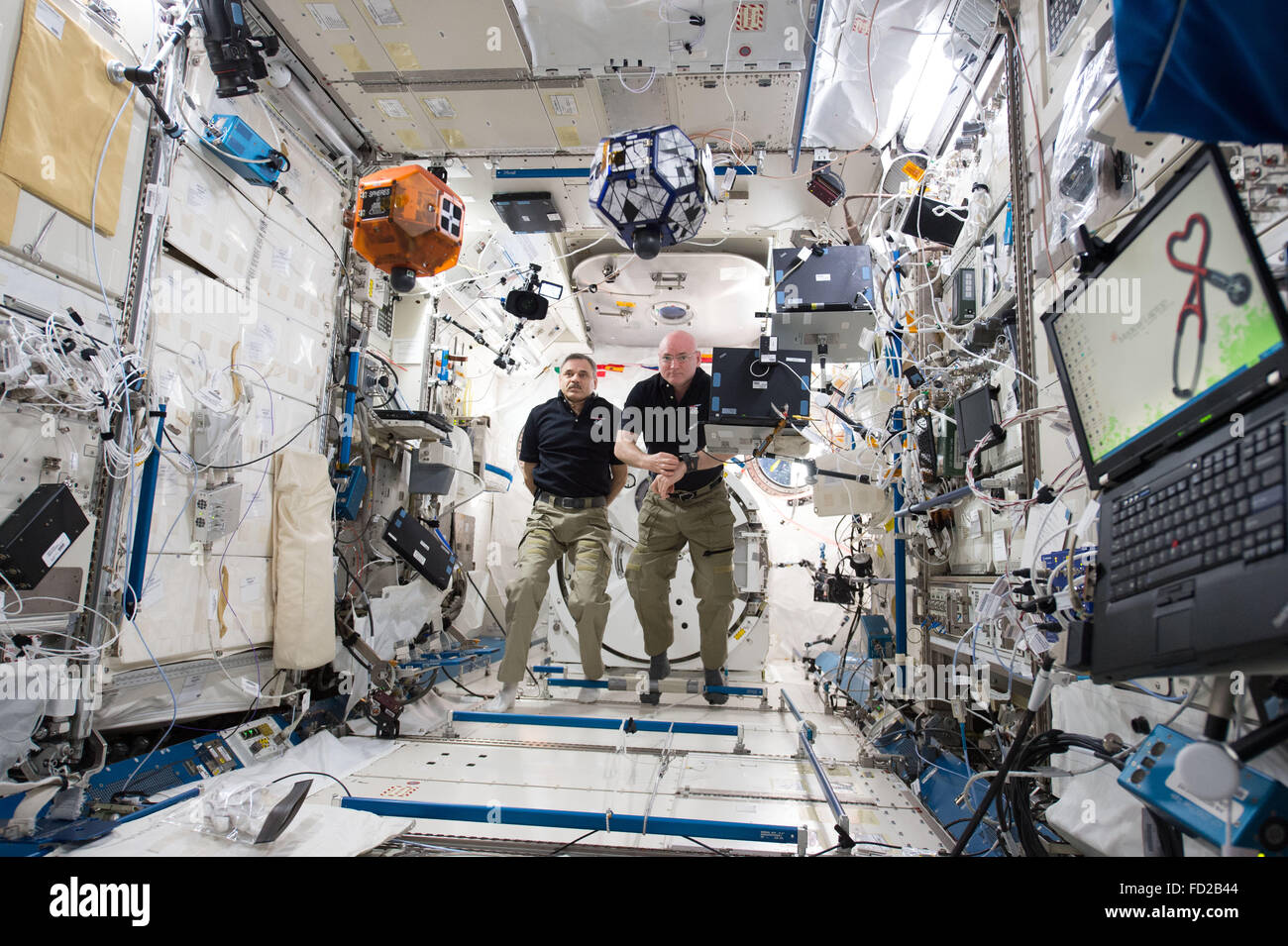 The Expedition 46 crew members NASA astronaut Scott Kelly (right) and ...
