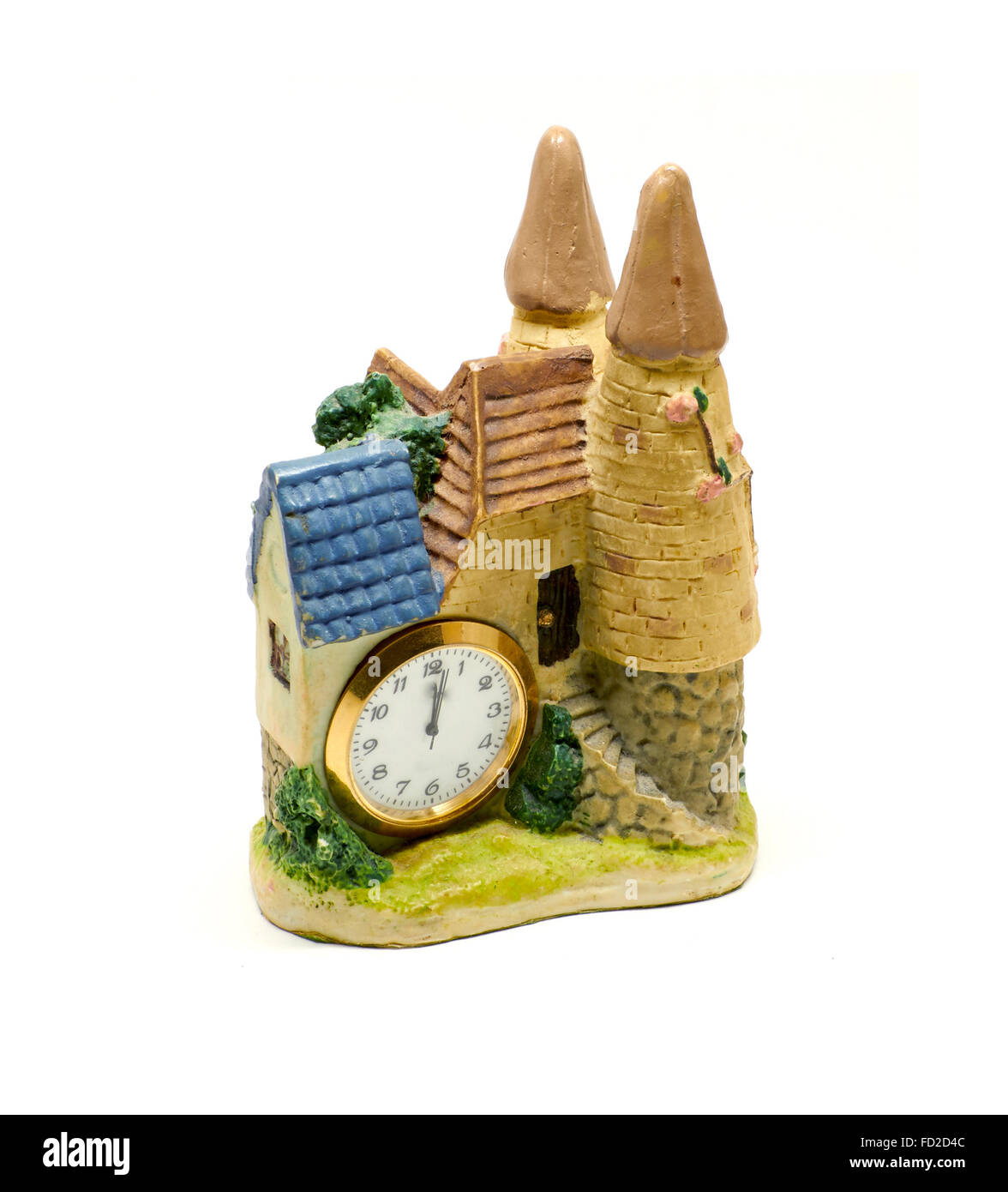 Clay figurine of castle with green trees with a clock Stock Photo - Alamy