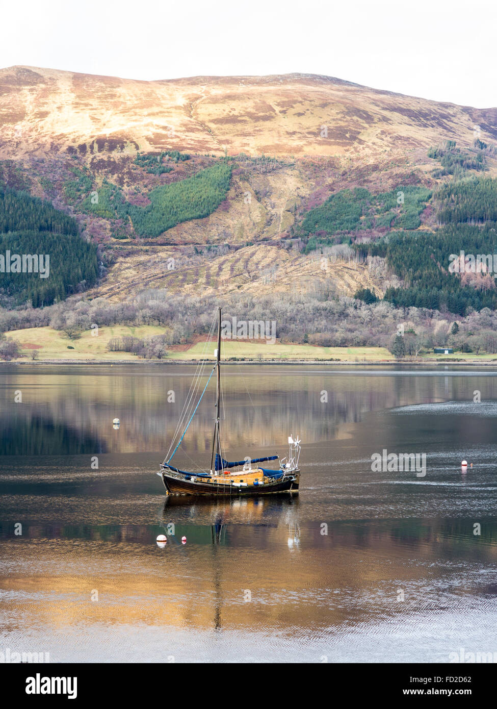 A boat on Loch Leven sea water loch near Fort William and Glencoe in ...