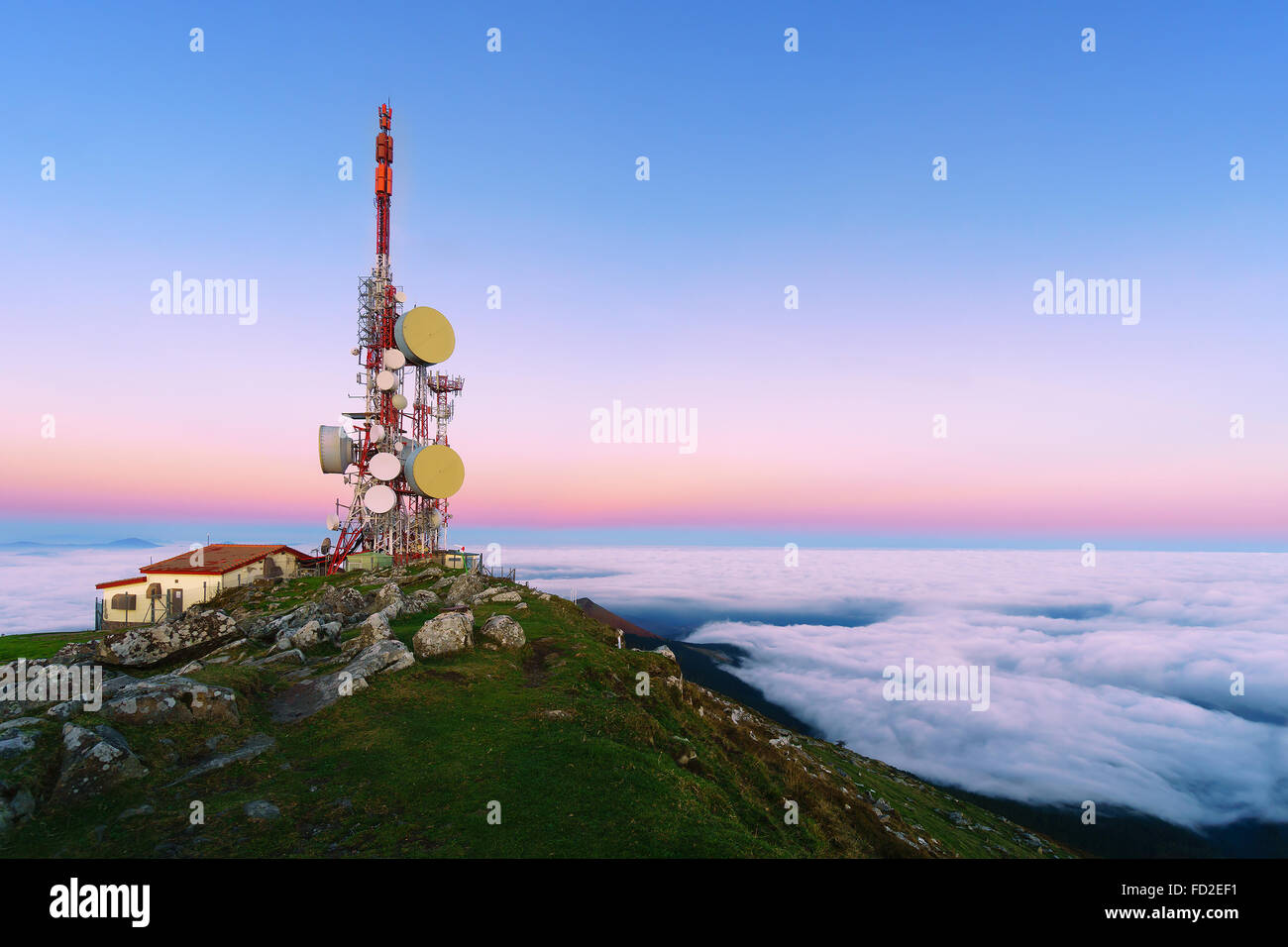 telecommunications tower on Oiz mountain top at the sunrise Stock Photo ...