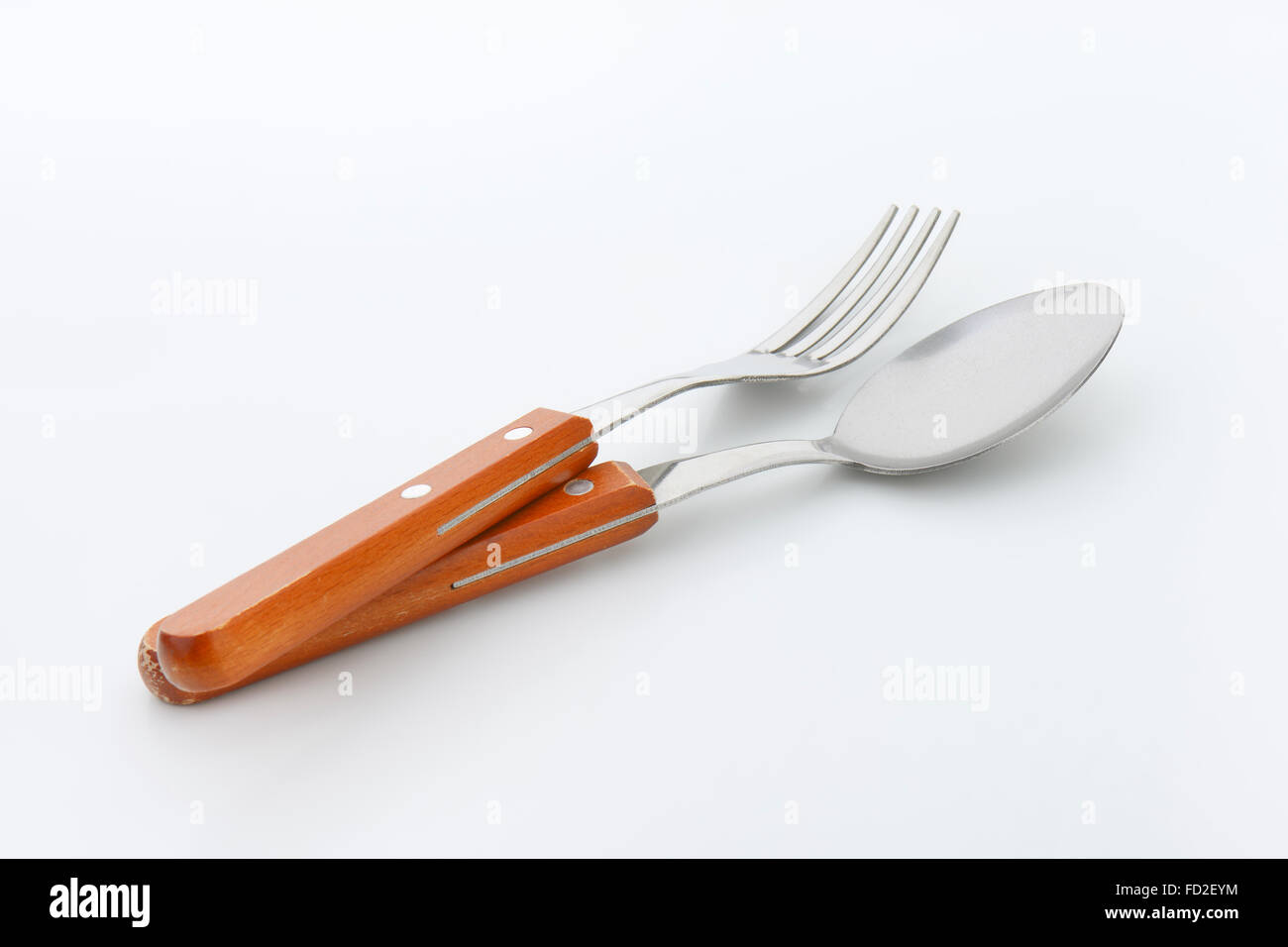 Dinner fork and spoon with wooden handles Stock Photo - Alamy