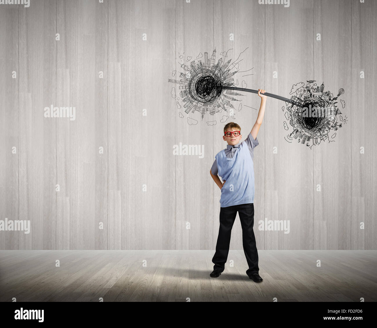 Boy of school age lifting barbell on one hand Stock Photo - Alamy