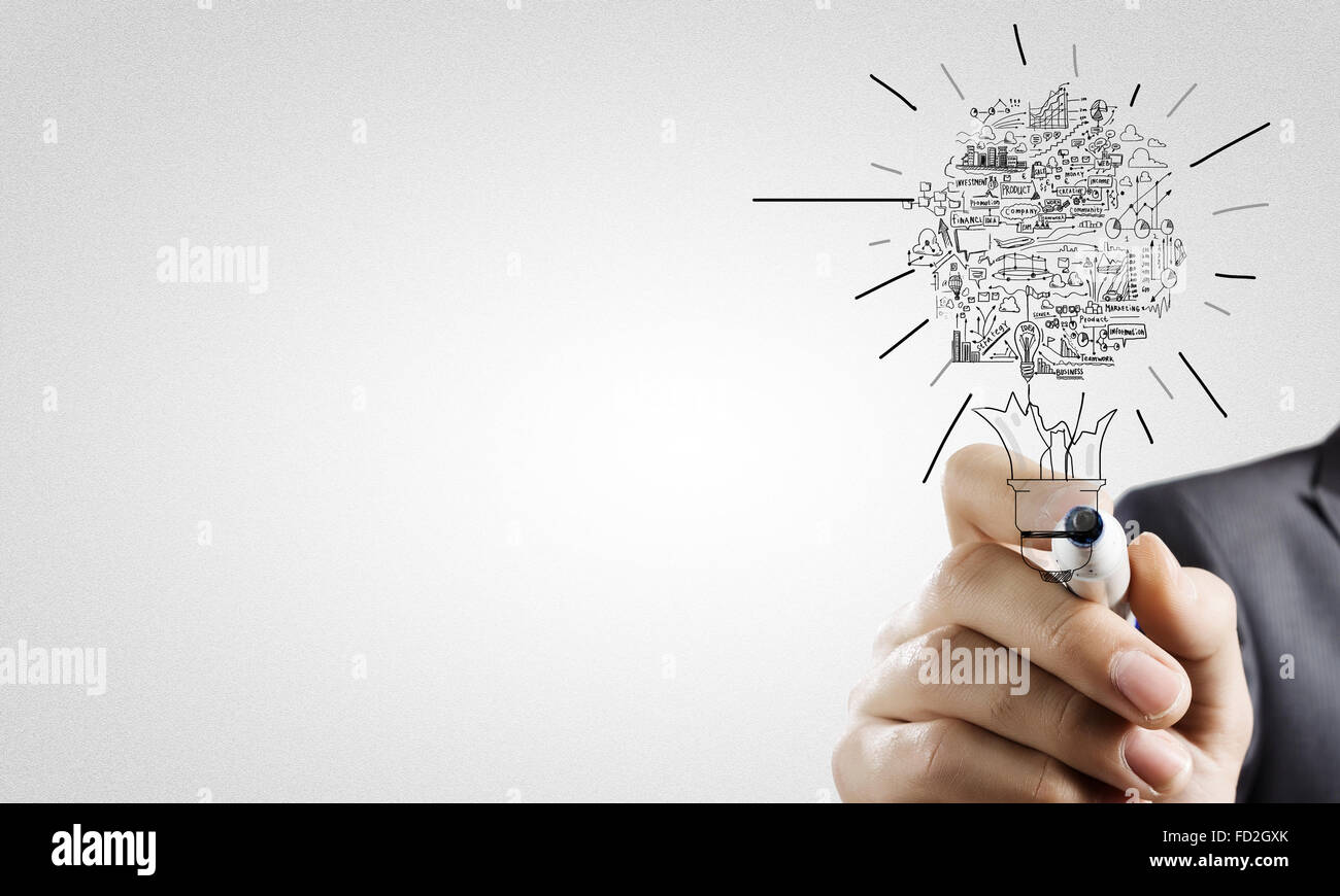 Close up of businessman hand drawing business strategy sketches Stock ...