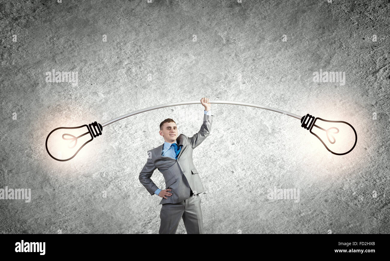 Strong businessman lifting heavy hi-res stock photography and images ...