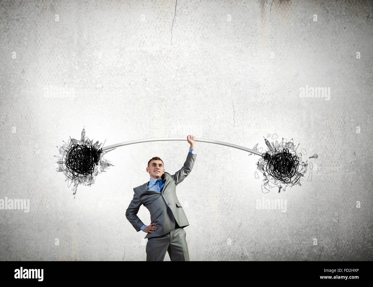 Young strong businessman lifting barbell hi-res stock photography and ...