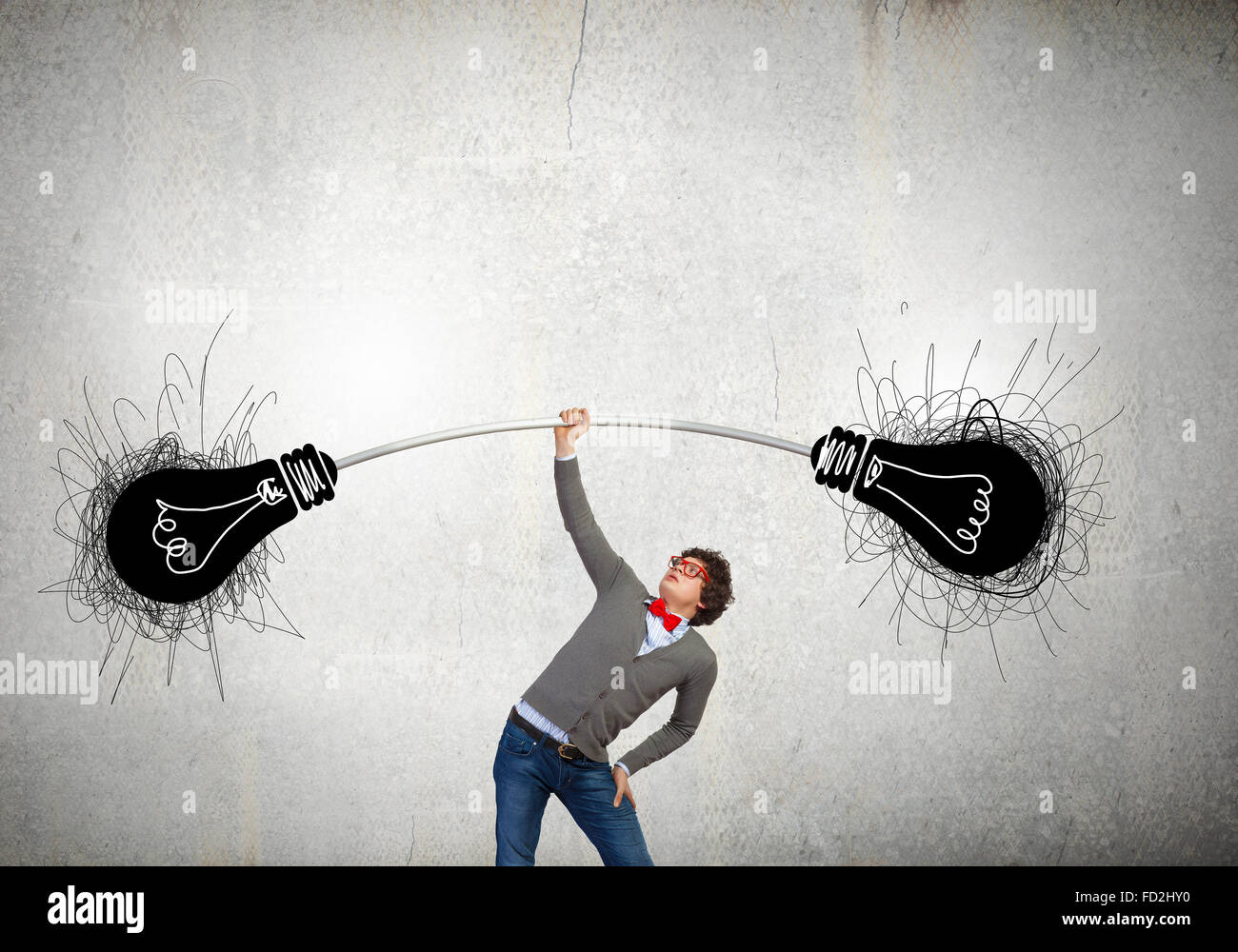 Young strong man lifting barbell on one hand Stock Photo - Alamy