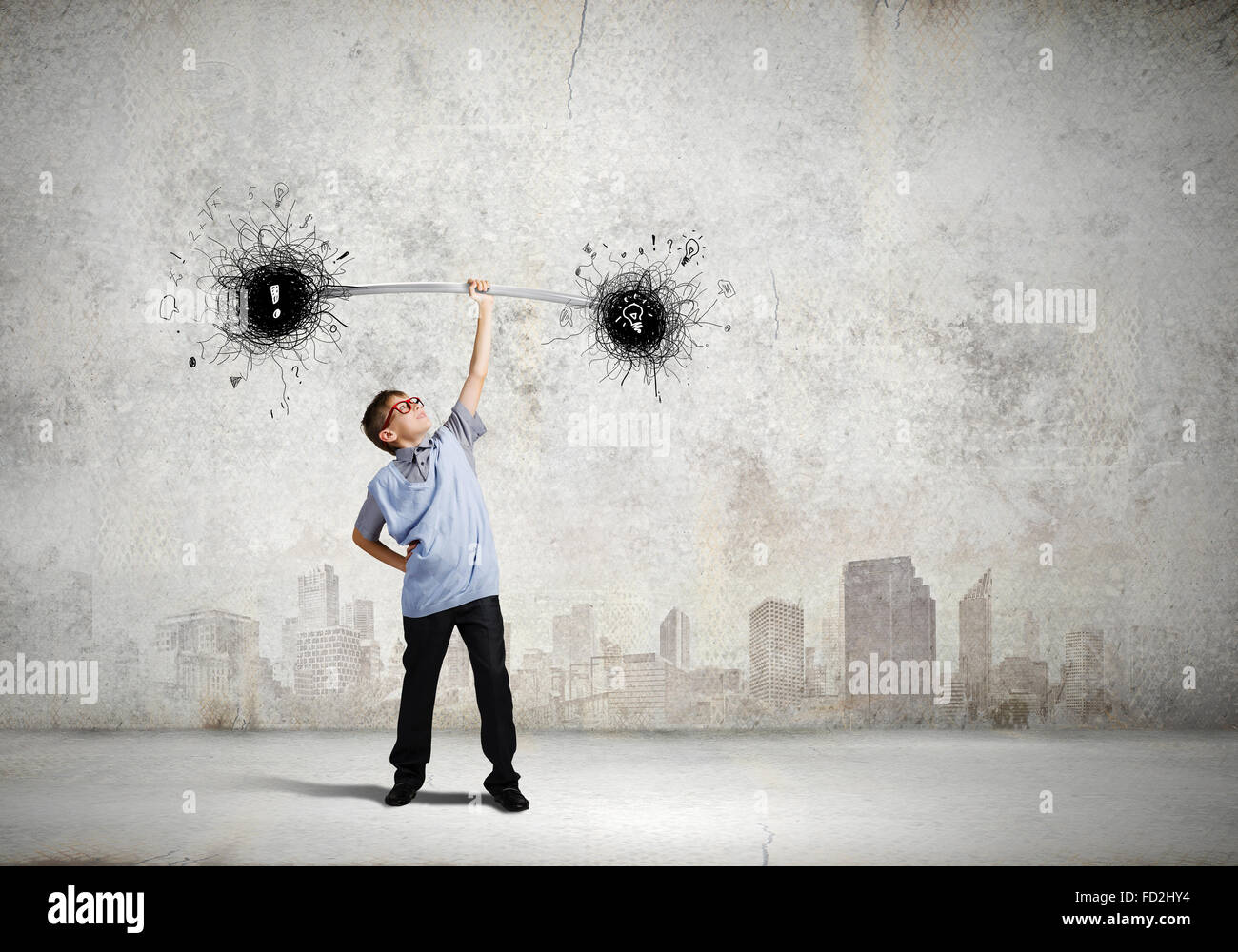 Boy of school age lifting barbell on one hand Stock Photo - Alamy