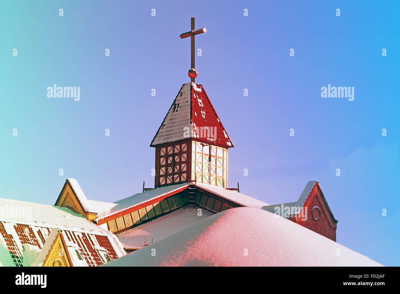 Beautiful Catholic Church photographed closeup on a background of blue ...