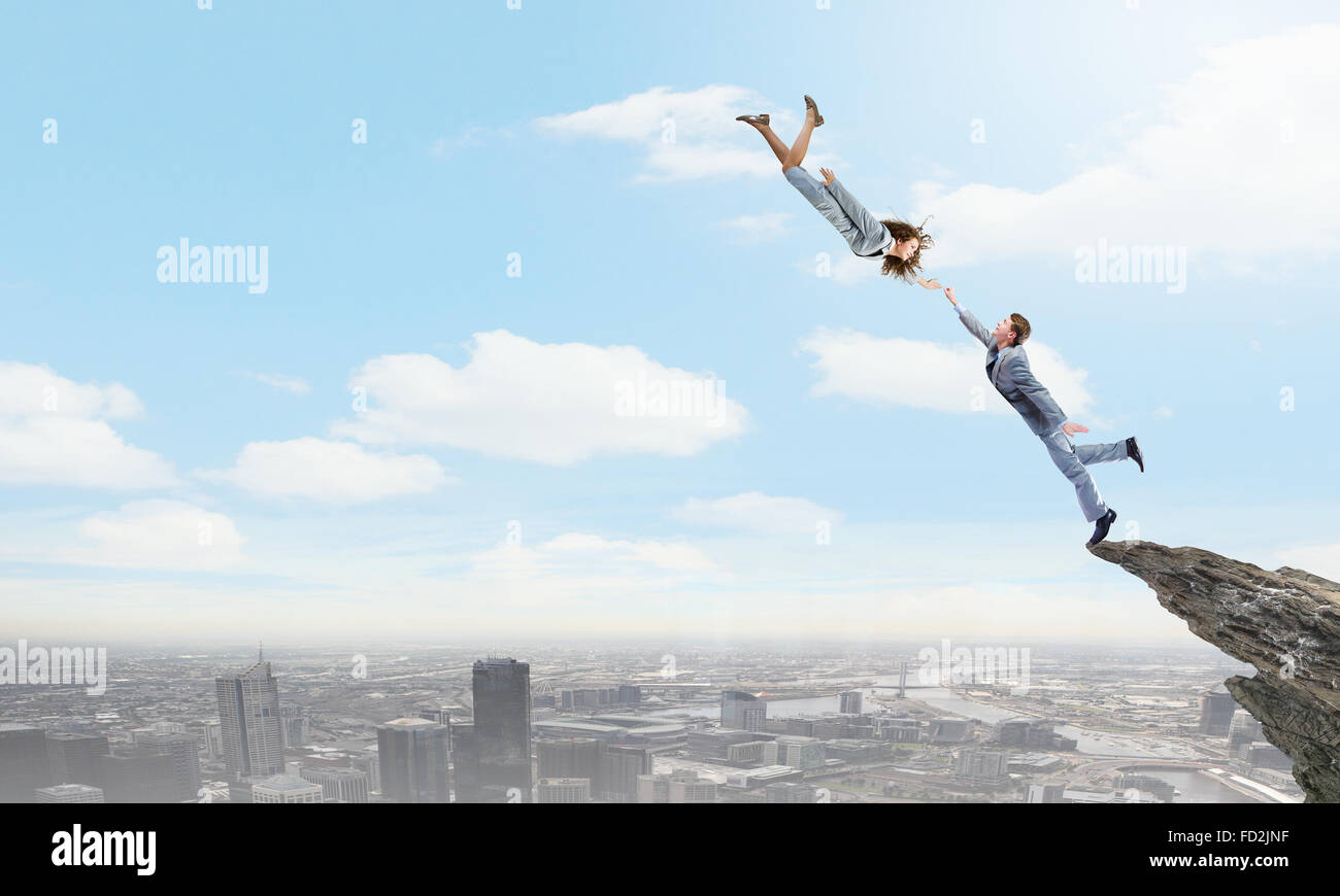 Super businessman businesswoman flying hi-res stock photography and ...