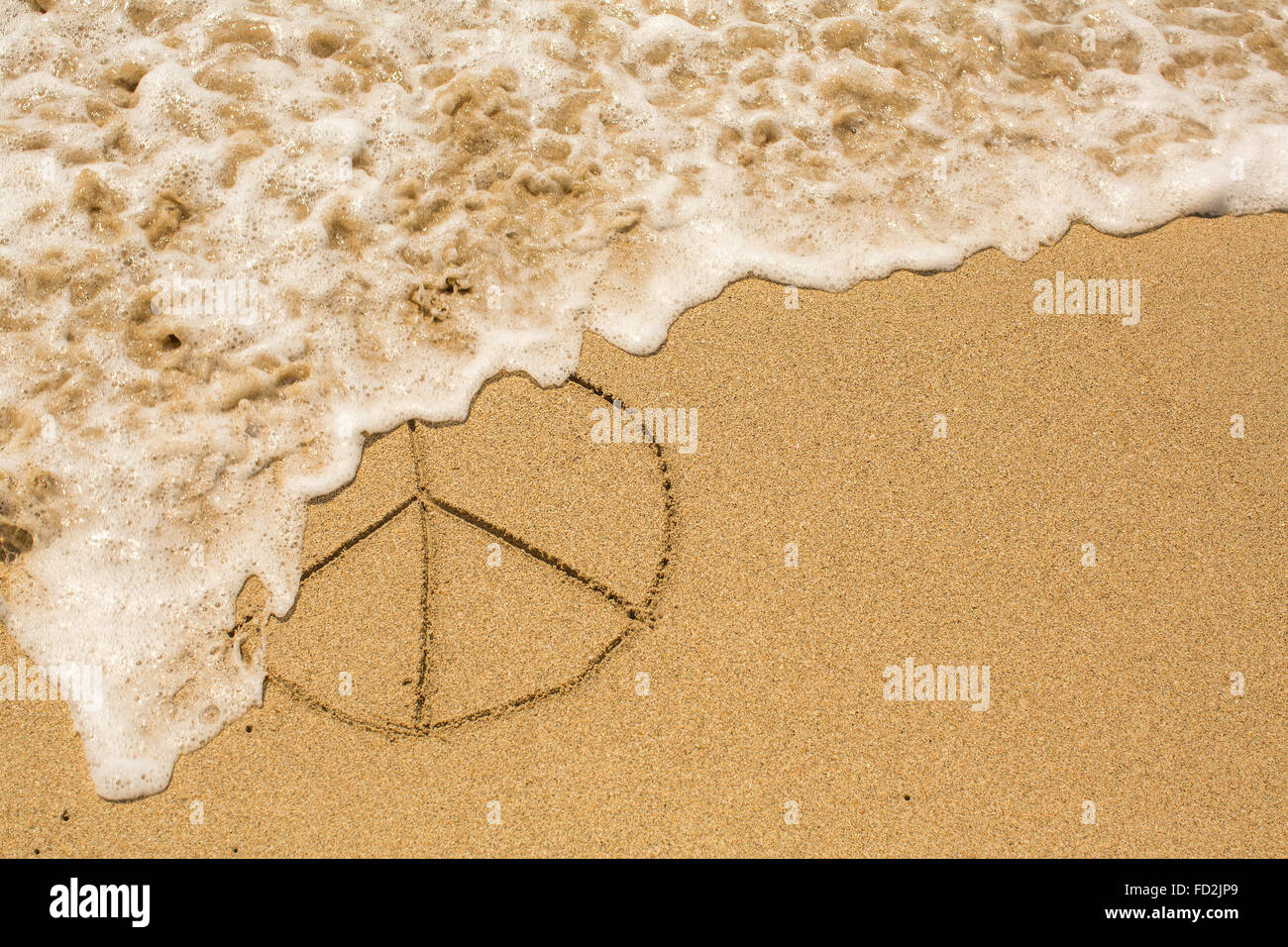Pacific - sign of peace painted on the beach sand, soft wave Stock ...