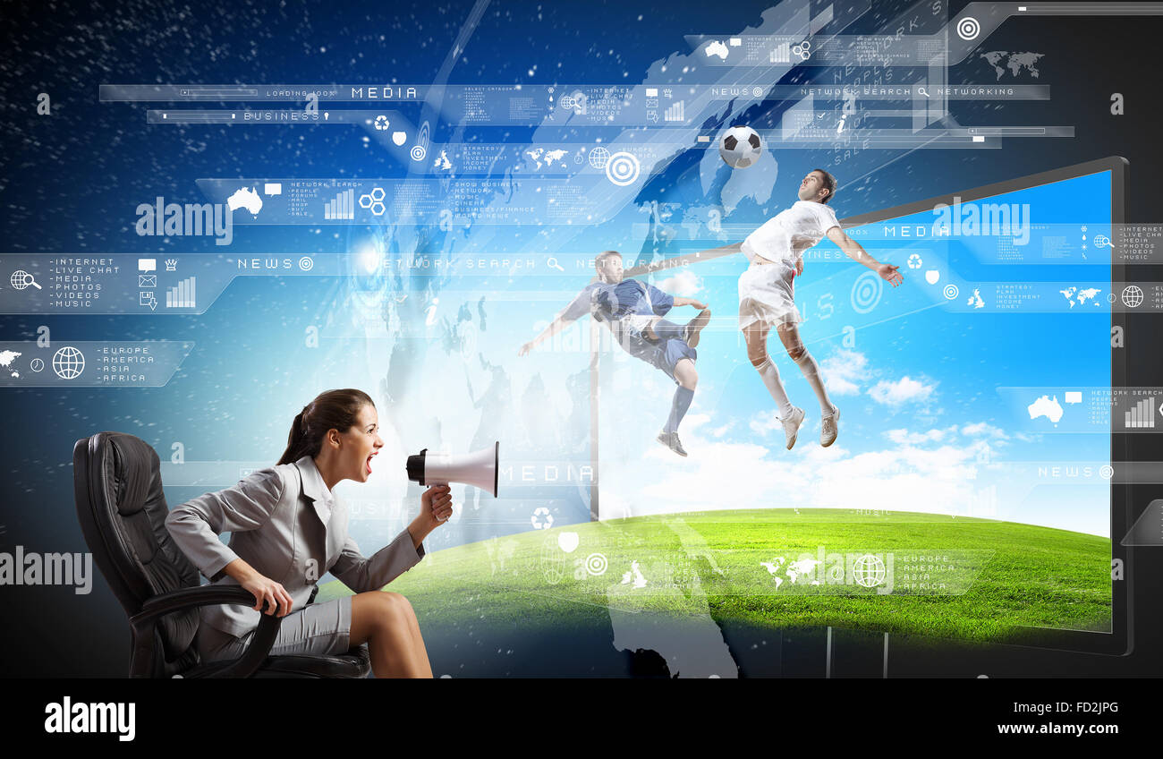 Emotional woman watching football match on 3 d tv Stock Photo - Alamy