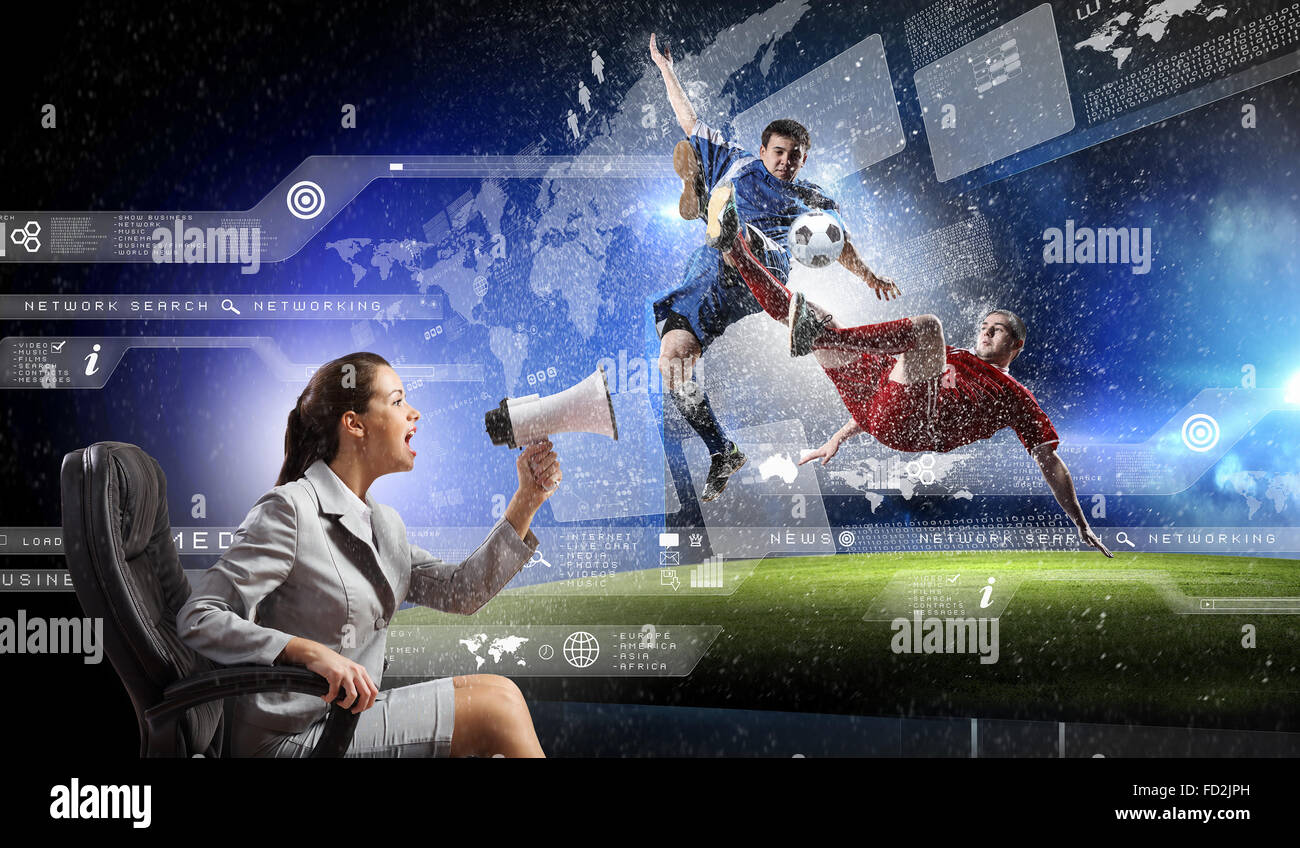 Emotional woman watching football match on 3 d tv Stock Photo - Alamy