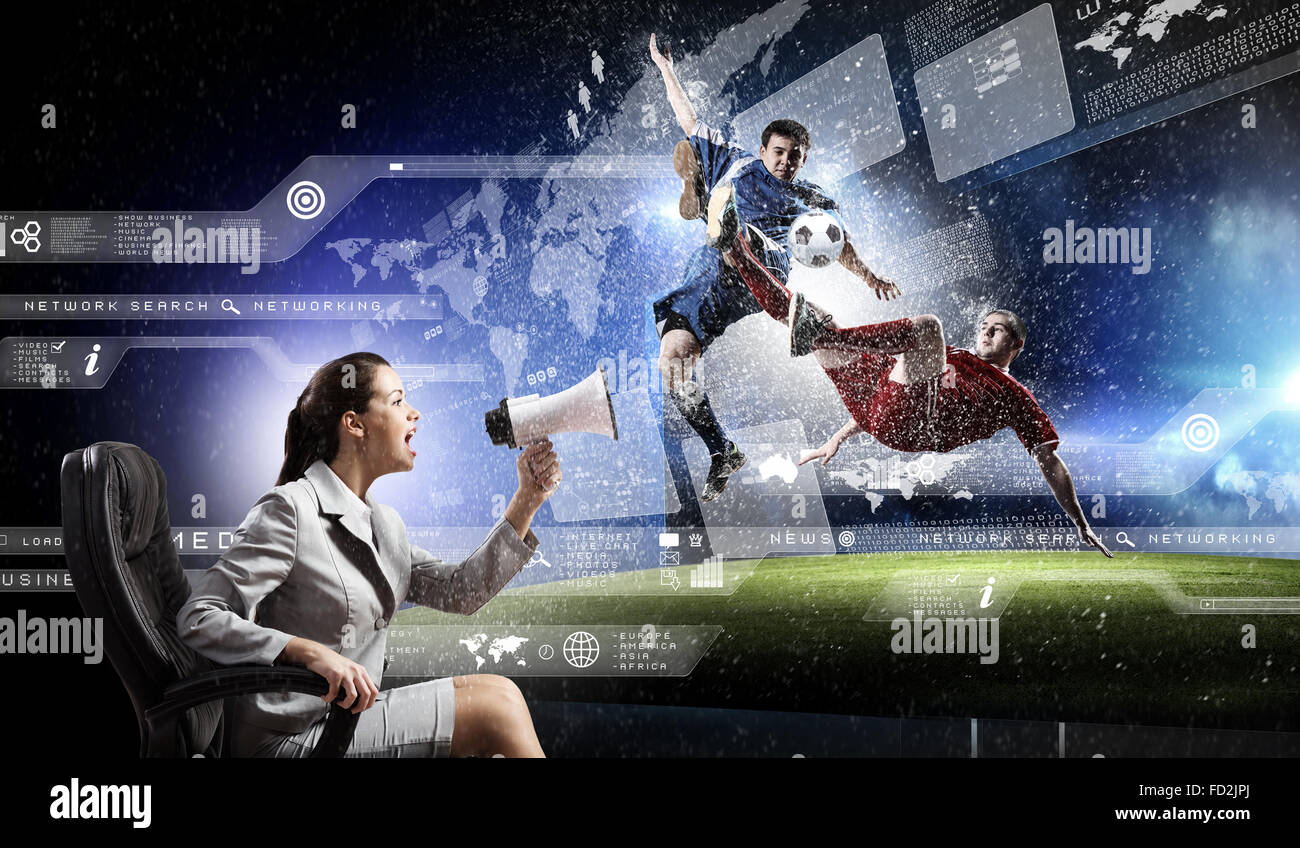 Emotional woman watching football match on 3 d tv Stock Photo - Alamy