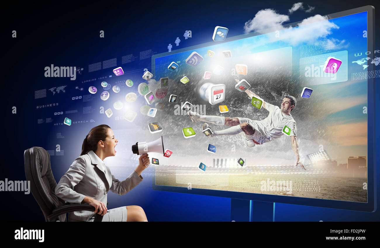 Emotional woman watching football match on 3 d tv Stock Photo - Alamy