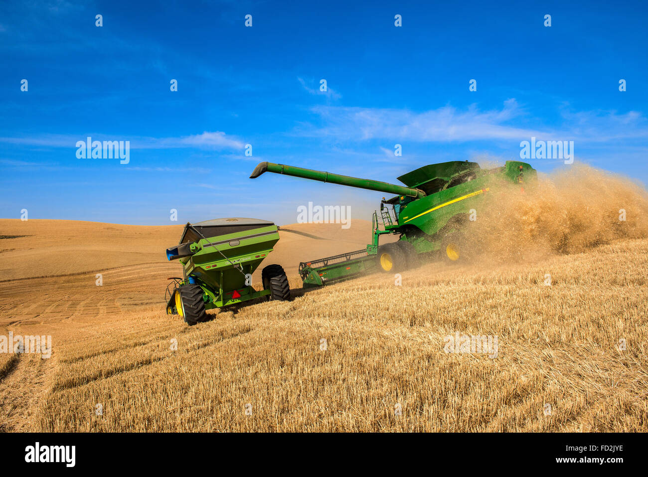 John Deere Combine Harvesting Wheat