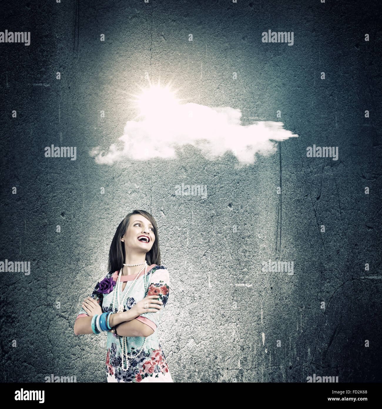 Young pretty woman standing under sun lights Stock Photo - Alamy