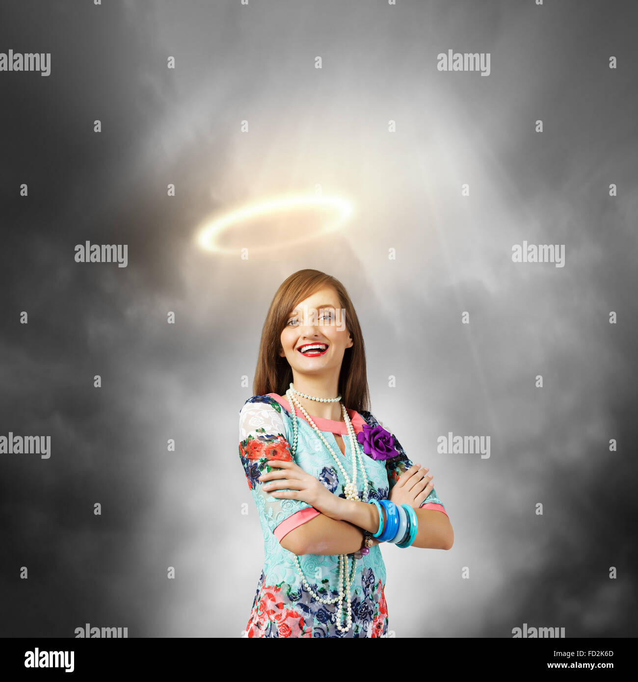 Young pretty woman with halo above head Stock Photo - Alamy