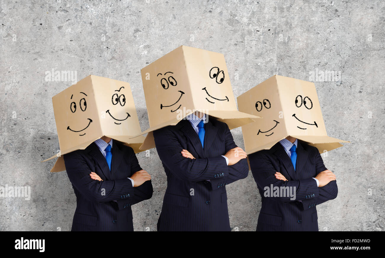 Unrecognizable business people wearing carton boxes on head Stock Photo ...